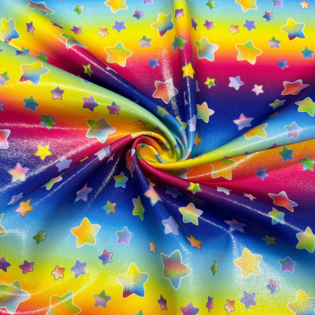 Rainbow Stars with Clear Foil | Wholesale Stretch Fabrics | Pine Crest ...